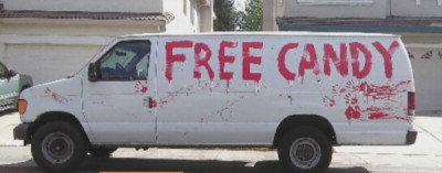 Parents on edge after spotting white van with 'free candy' painted in ...