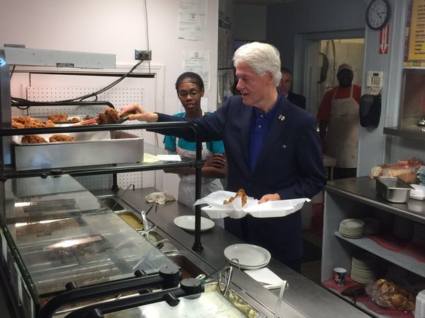 Bill Clinton visits Louisville, 'literally serves fried chicken to ...