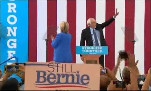 VIDEO: 'Still Bernie' sign waves in front of camera at Hillary 'unity ...